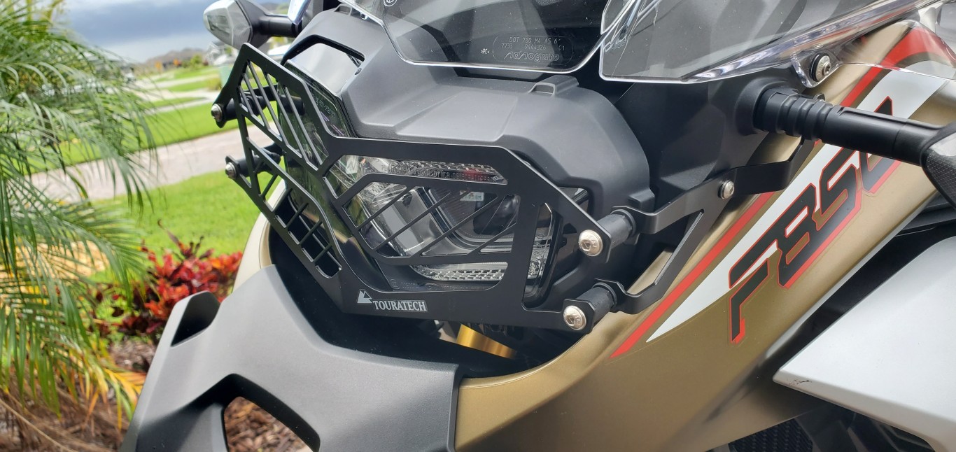 Touratech's Quick Release Stainless Steel Headlight Guard for BMW ...